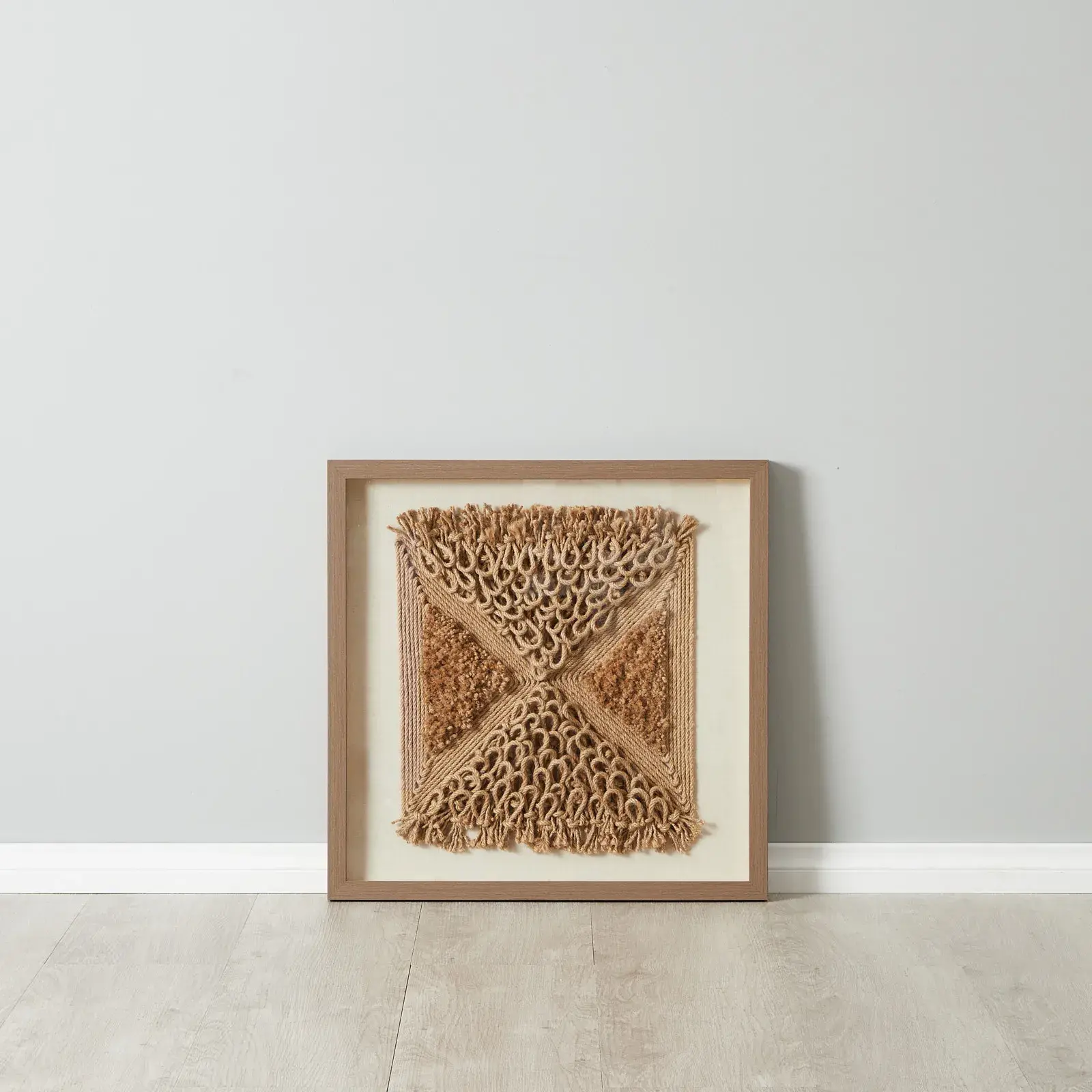 Feather Shadow Box with Light Brown Frame