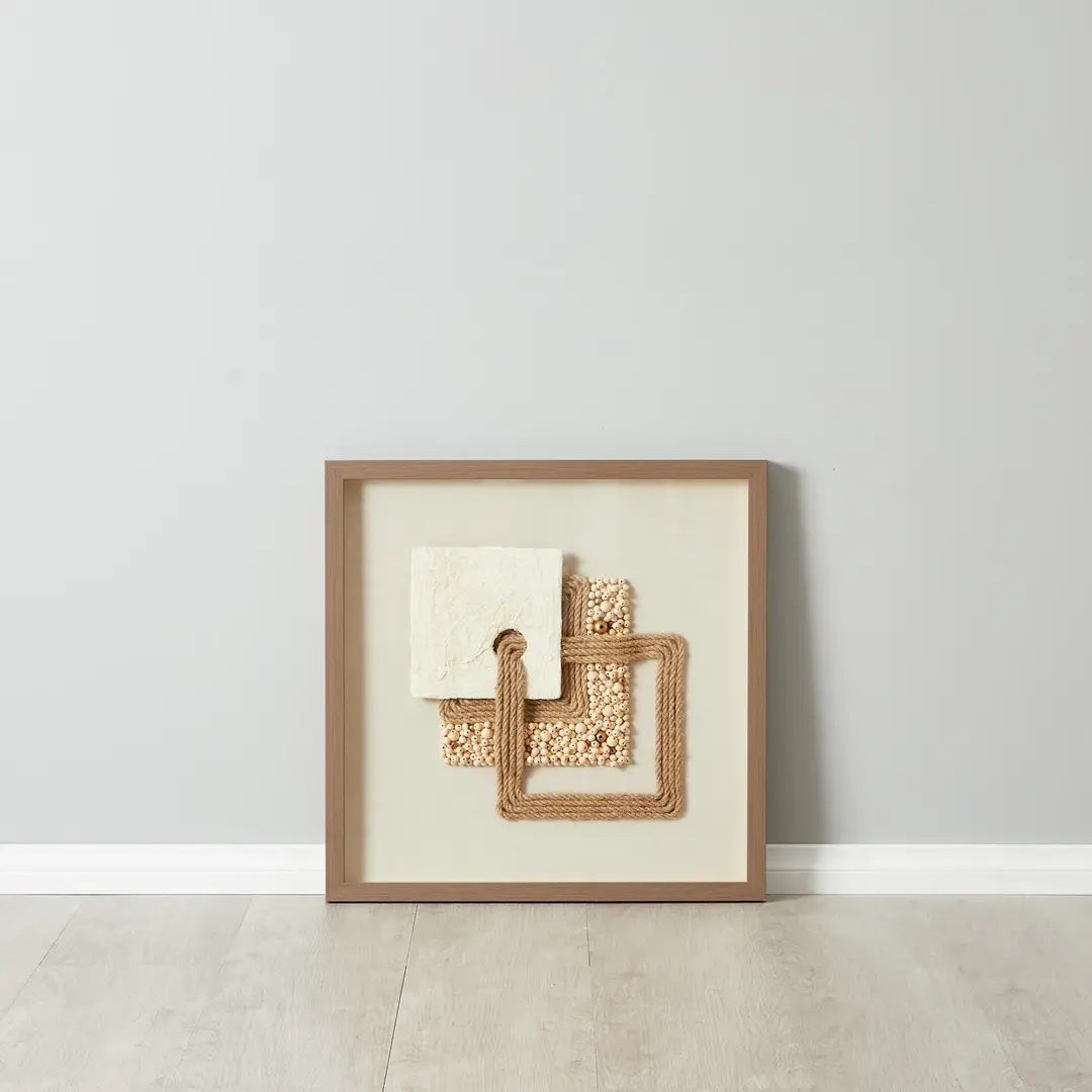 Feather Shadow Box with Light Brown Frame