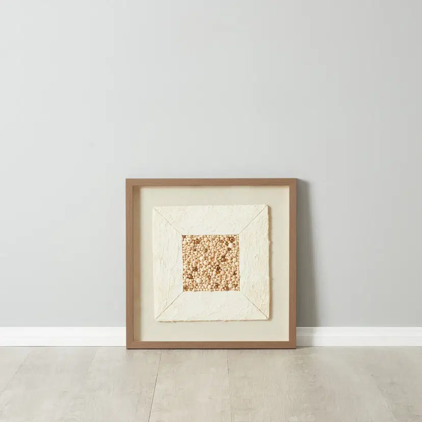 Feather Shadow Box with Light Brown Frame